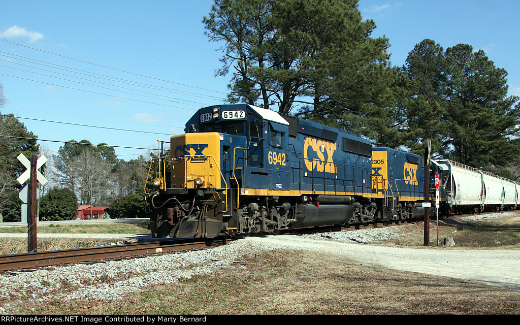 CSX 6942 and 2305 East of Town